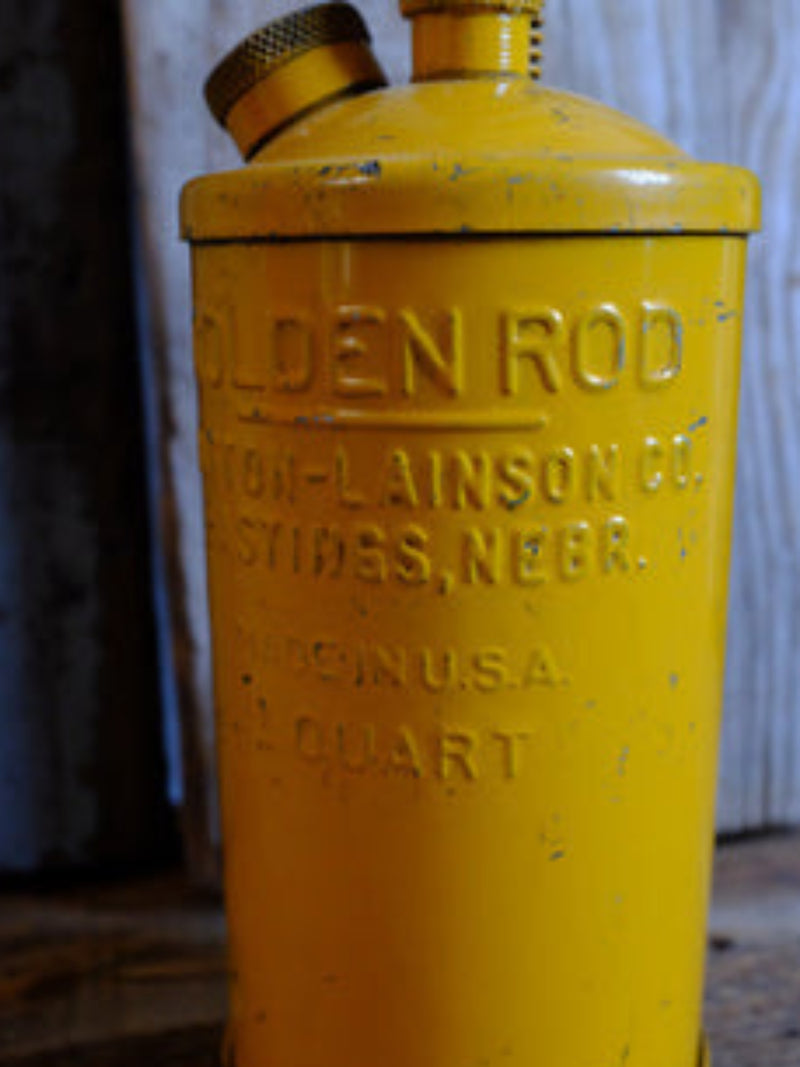 vintage yellow oil can - Antares Furnishings
